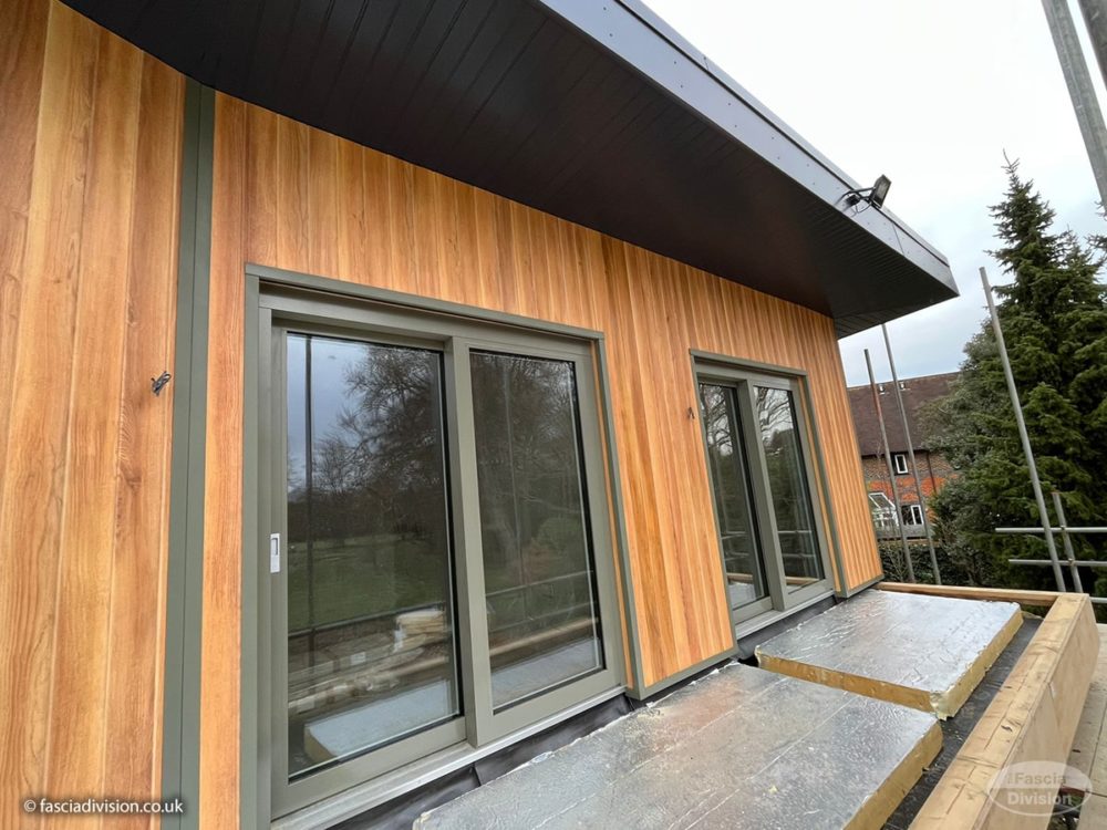 Durasid Foresta cladding in Red Cedar, anthracite fascias and soffits ...