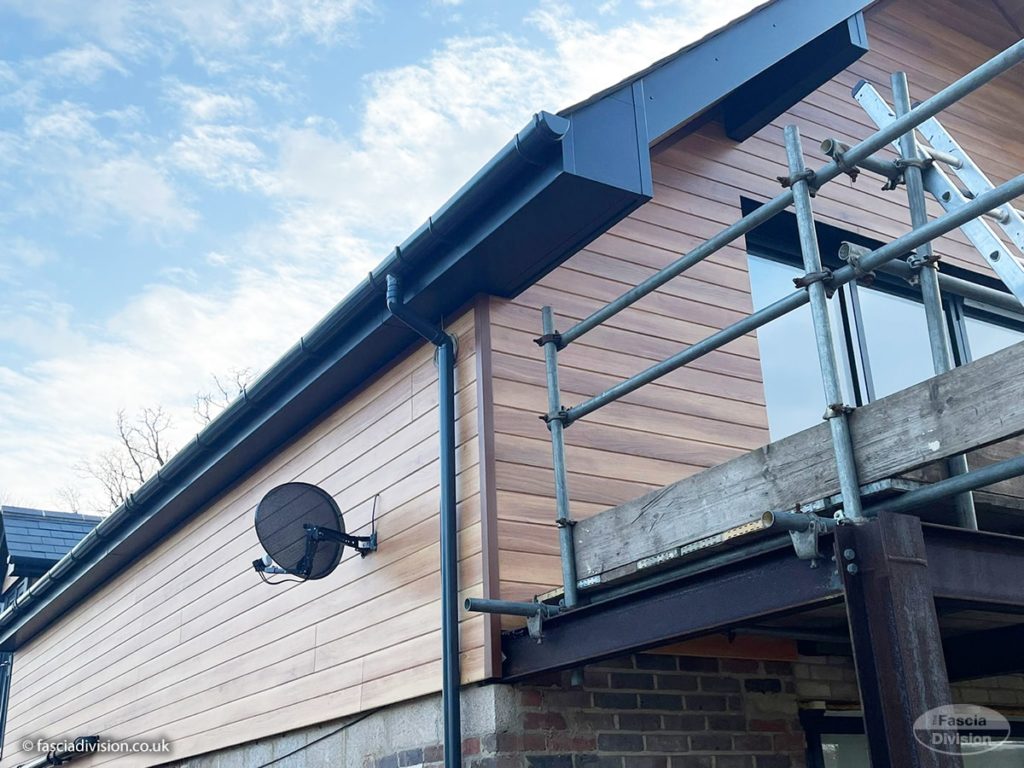 Anthracite fascia with Durasid Foresta Red Cedar cladding | The Fascia ...