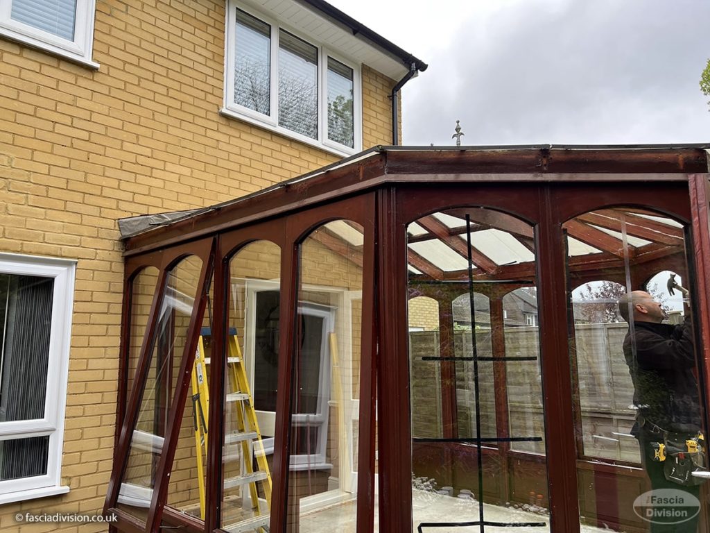 Conservatory renovation with warm roof, UPVC frames, and new windows ...