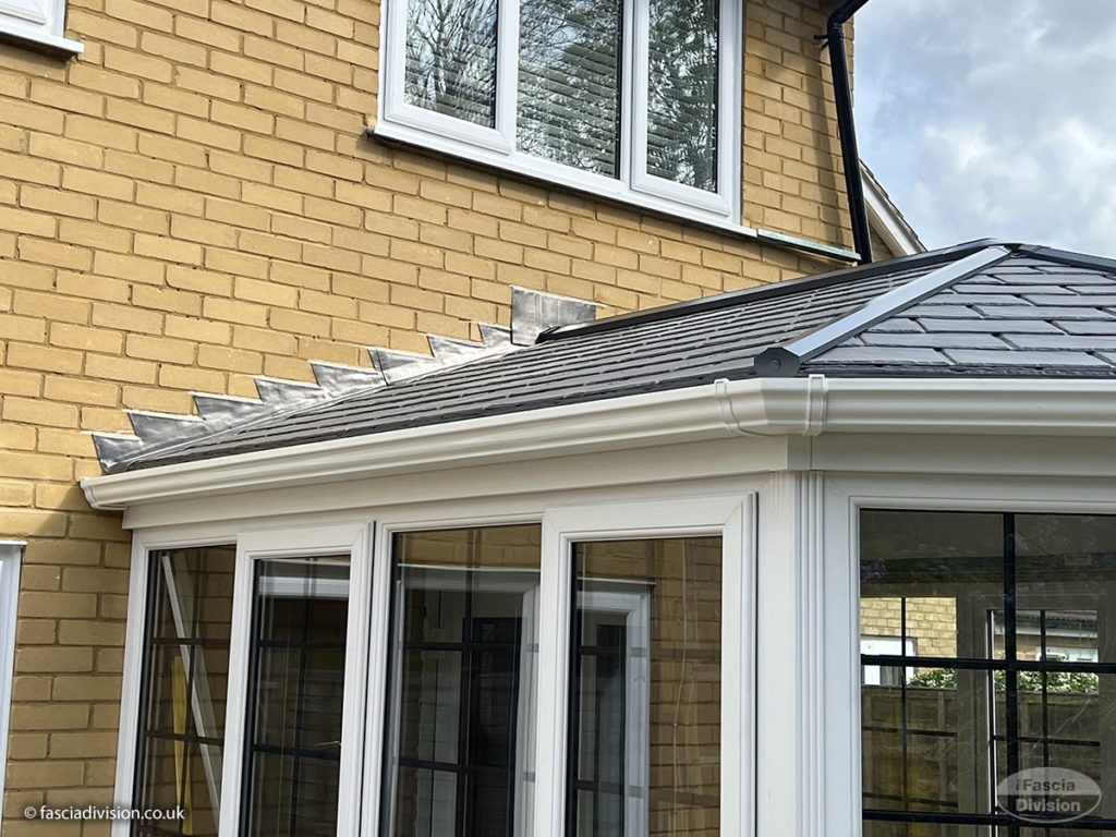 Conservatory renovation with warm roof, UPVC frames, and new windows ...