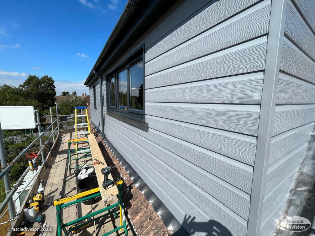 Fortex cladding, anthracite fascia, soffit, guttering and windows ...